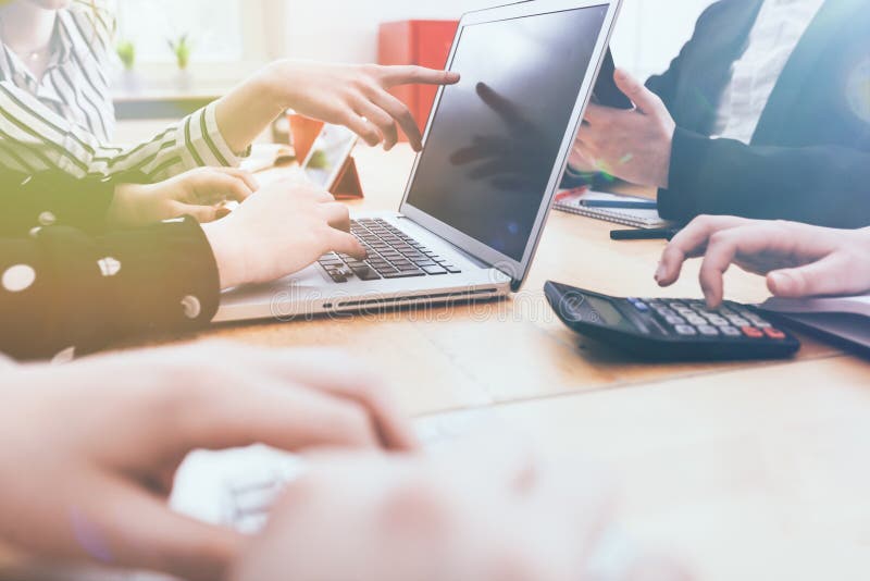 Together at Laptop Computer in Small Business Office with Young Stock ...