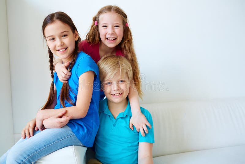 Affectionate kids stock photo. Image of company, indoor - 57560352