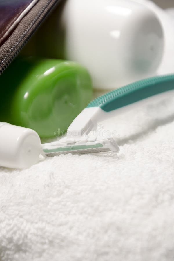 Toilet Bag with Set of Cosmetics and Razor Stock Photo - Image of ...