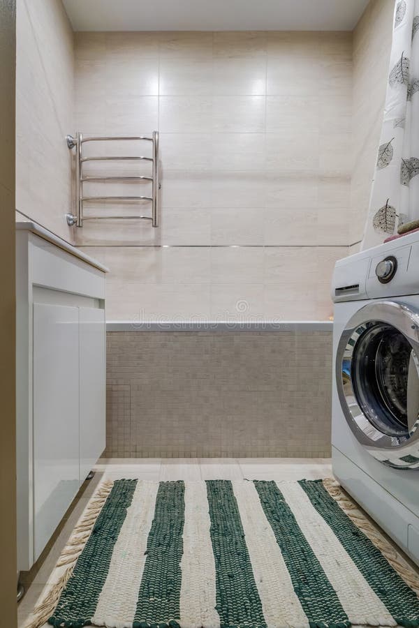 Toilet And Detail Of A Corner Shower Cabin With Wall Mount Shower