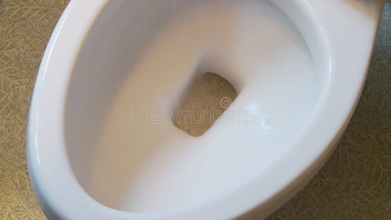 Toilet flushing stock footage. Video of swirl, flushing - 257822432