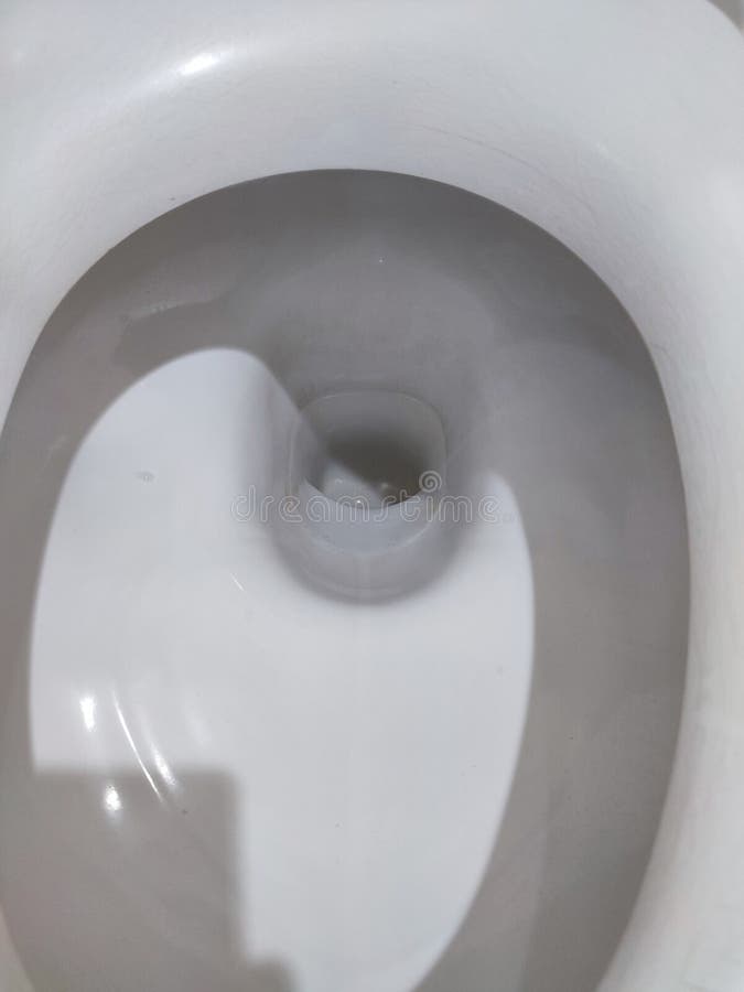 Toilet, Flushing Water, Close Up Illuminated by Artificial Light Stock ...