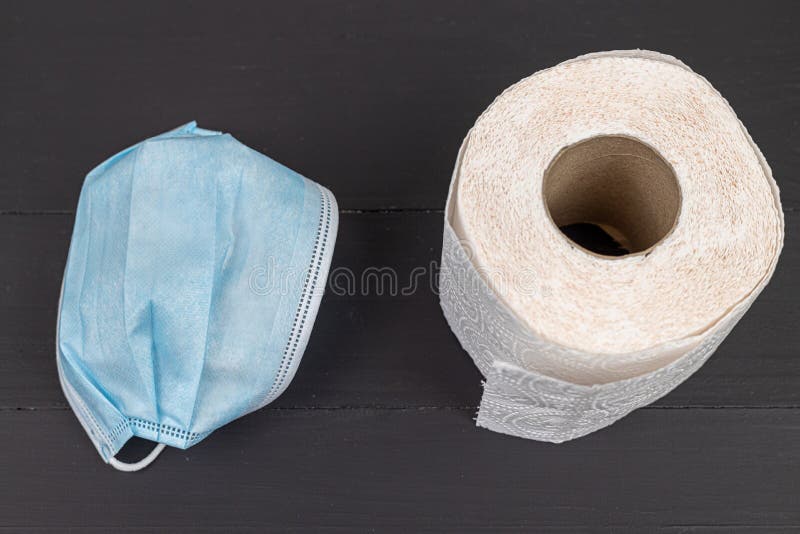 Toilet Paper with Blue Protective Surgical Mask with Copy Space Stock ...