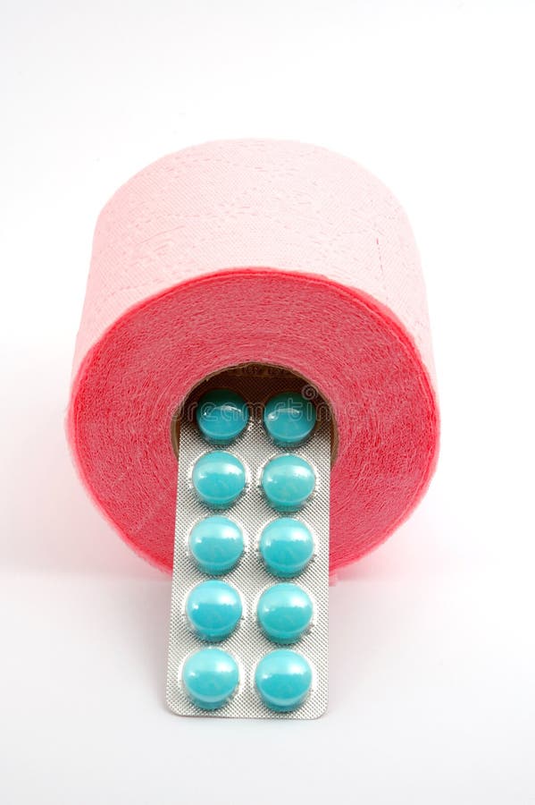 Toilet paper and pills stock image. Image of feel, lying - 3779787
