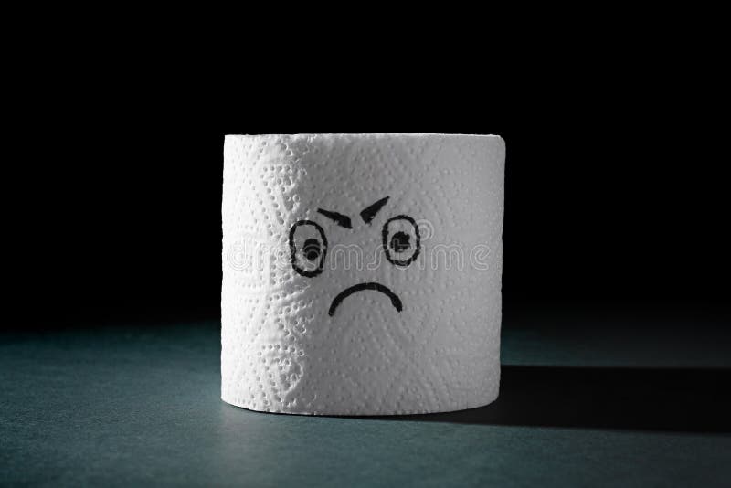 Toilet Paper Roll with Drawn Angry Face on Dark Table Stock Photo ...