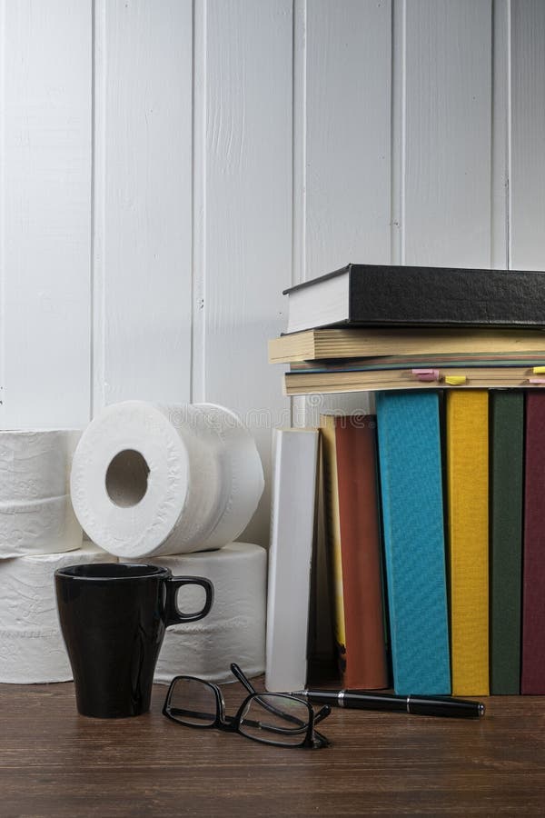 Toilet Paper Rolls and Books Stock Photo - Image of potty, roll: 192443860