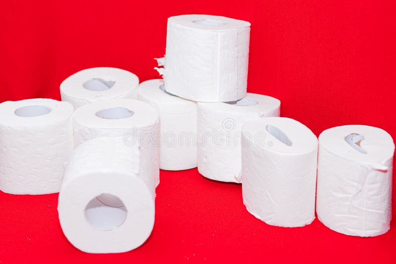 Toilet Paper Rolls on a Red Background . the Lack of Toilet Paper Stock ...