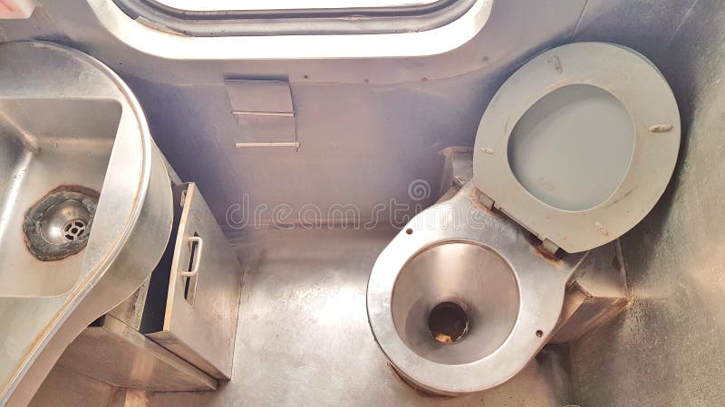 Toilet of a train editorial photo. Image of indian, pipe - 128658606