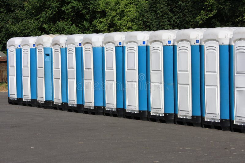 Row of Red Portable Toilets Stock Image - Image of festival, summer ...