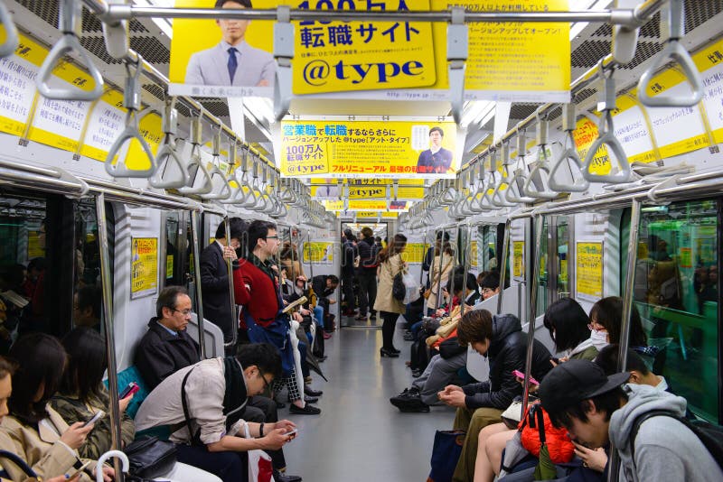 Tokyo, Japan - April 1, 2015 : Commuters Inside the Japan Railway Train ...