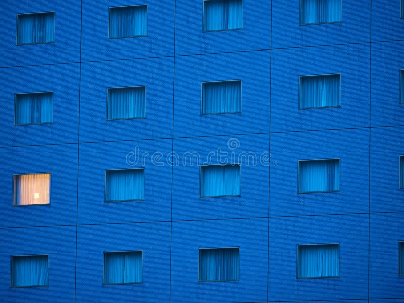 External View of Room Windows of a Hotel in the Night Stock Photo ...