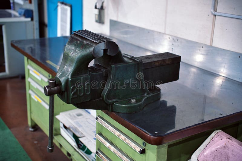 A big vise on a desk stock image. Image of vise, deskn - 237808535