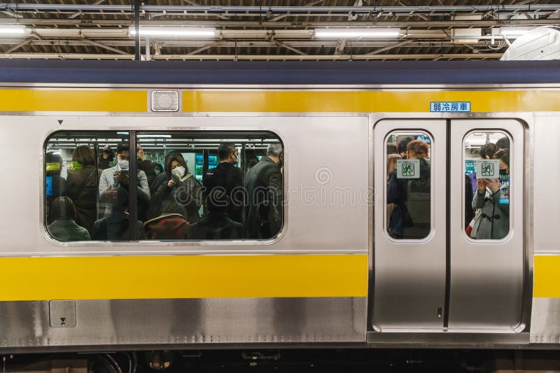 Tokyo, Japan - March 2nd 2023 - Crowded Tokyo Train during Rush Hour ...