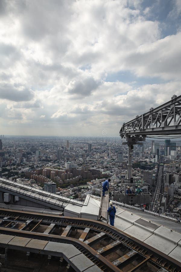 Worker Cleaning the Window of the High Building in Tokyo Japan ...