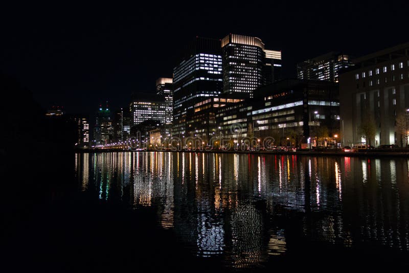 Tokyo Skyline at Night with Water Reflections Stock Photo - Image of ...