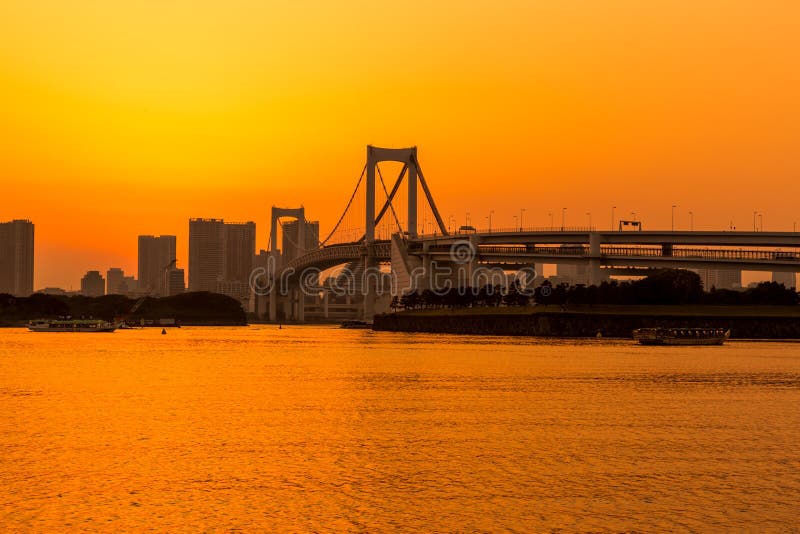 Tokyo Skyline and Rainbow Bridge at Sunset in Odaiba Waterfront Stock ...