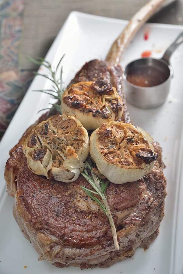 Tomahawk Beef stock photo. Image of baked, plate, lettuce - 82810890