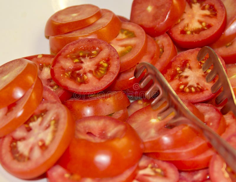 Tomatenscheibe stockfoto. Bild von tomate, material, bestimmungen ...