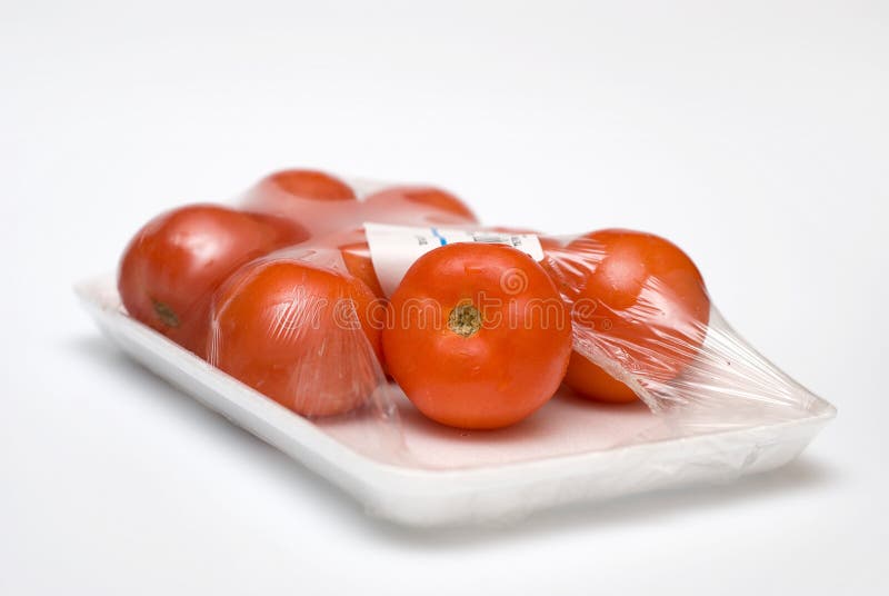 Tomates no pacote foto de stock. Imagem de pequena, varejo - 6981894