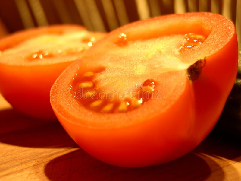 Tomato Cut in Half stock image. Image of isolated, slices - 27795341