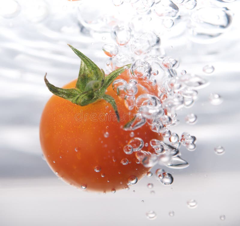 Tomato drop in water stock photo. Image of water, clean - 11047796