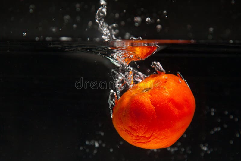 Red Tomato Falling Down in Water Glass Stock Image - Image of clear ...