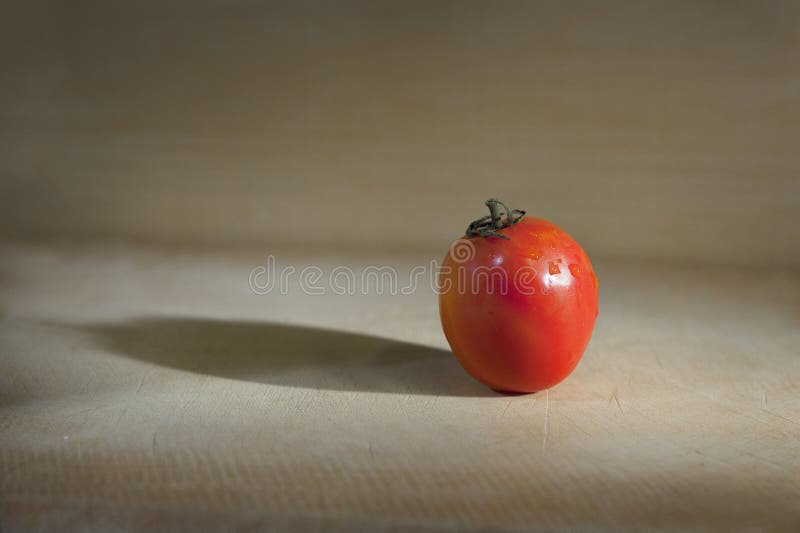 Tomato in Kitchen stock photo. Image of tomato, shadow - 83548954