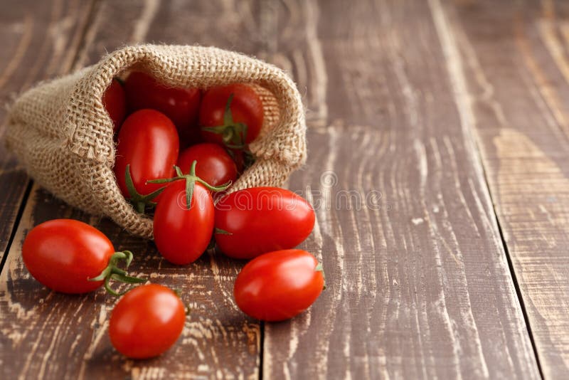 Tomato Nutrition Vegetable on Wood Front View Stock Image - Image of ...