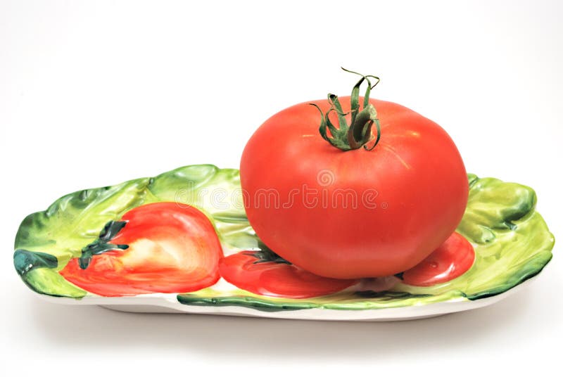 Tomato on plate stock photo. Image of meal, healthy, sweet - 10434074