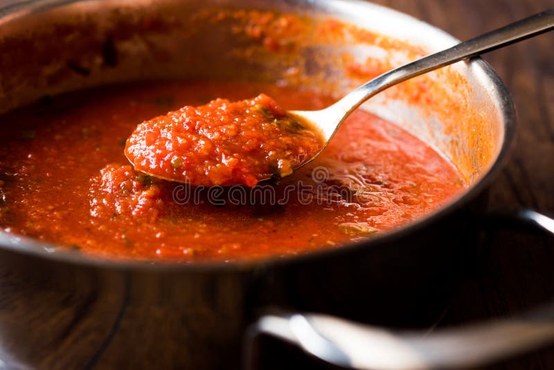 Tomato Sauce with Spoon in Metal Pan Stock Image - Image of garlic ...