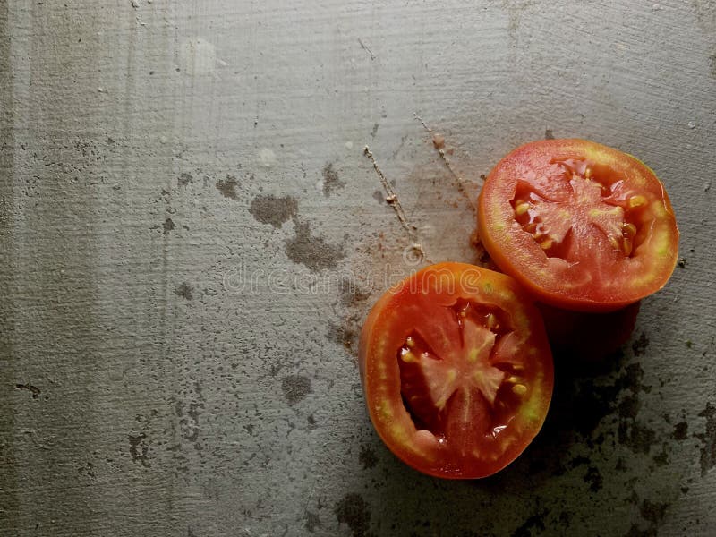 Tomato Sliced with Overhead View on Rustic Background in Studio ...