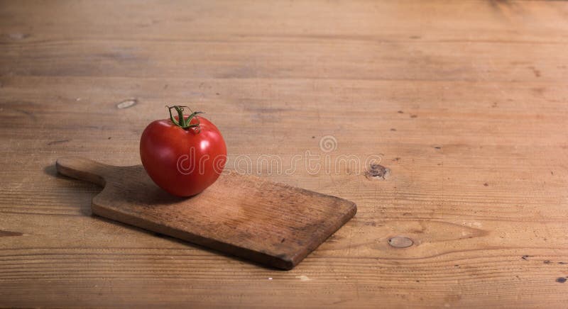 Tomato on table stock photo. Image of healthy, table - 120740878