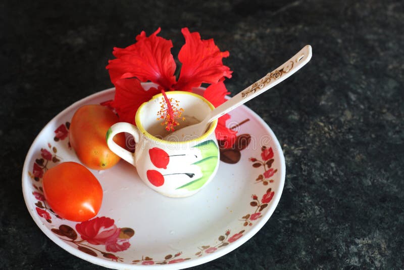Tomato and Tea Cup with Spoon and Flower Stock Image - Image of yellow ...