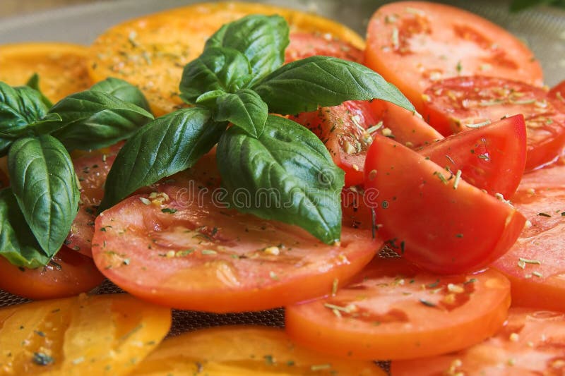 Tomatoes with basil stock image. Image of salad, vinaigrette - 1128879