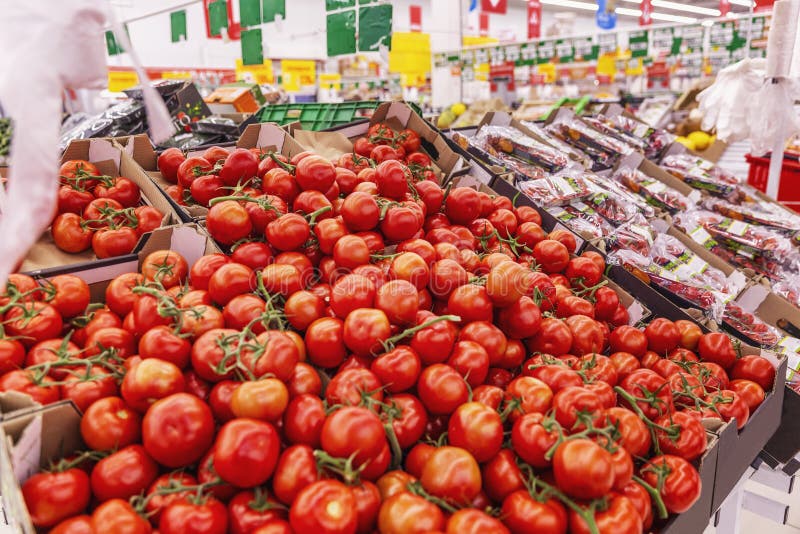 Tomatoes in a supermarket stock image. Image of different - 13465003