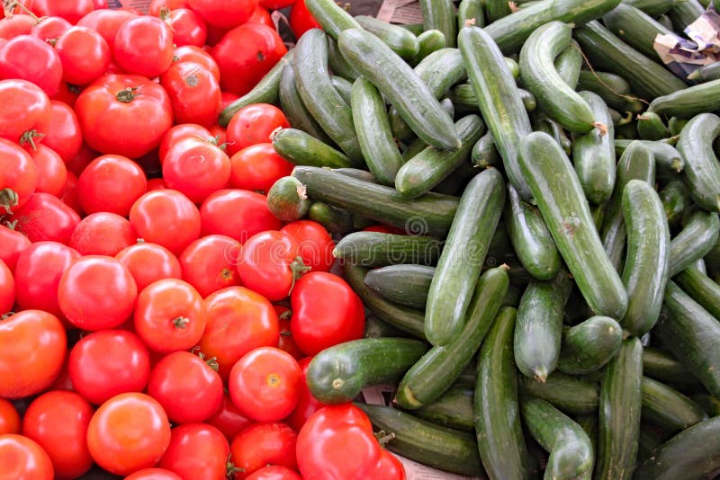 Tomatoes and Courgettes on Display on a Market Stall Stock Photo ...