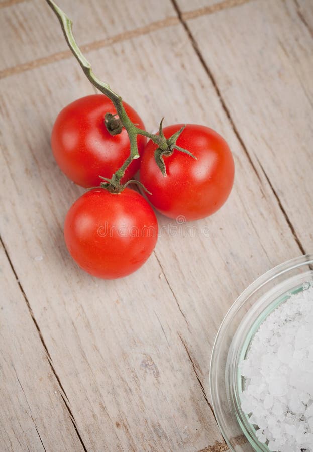 Tomatoes and salt stock image. Image of board, food, wood - 24325525