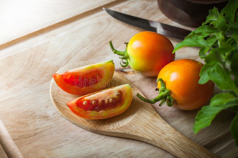 Tomatoes Slice on Wood Ladle Stock Photo - Image of industrial, biology ...