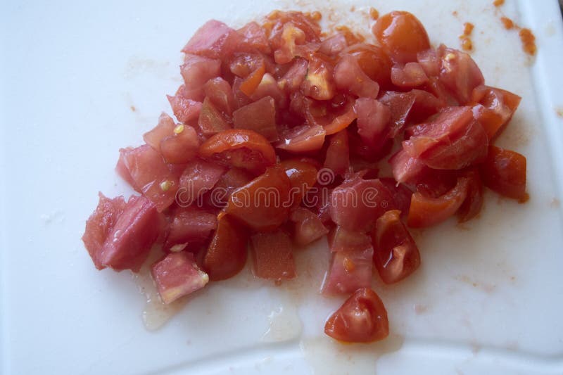 Tomatoes in small pieces stock image. Image of tomatoes - 375135773