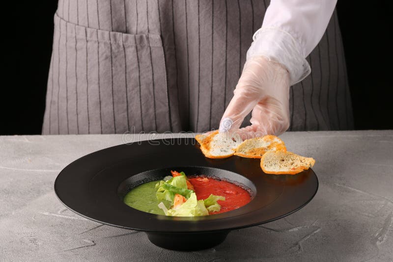 Tomatoes Soup with Hands. Chef Decorating Plate. Kitchen Processing ...