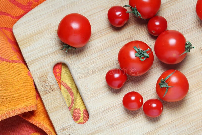Tomatoes on the table stock photo. Image of fresh, healthy - 150867226