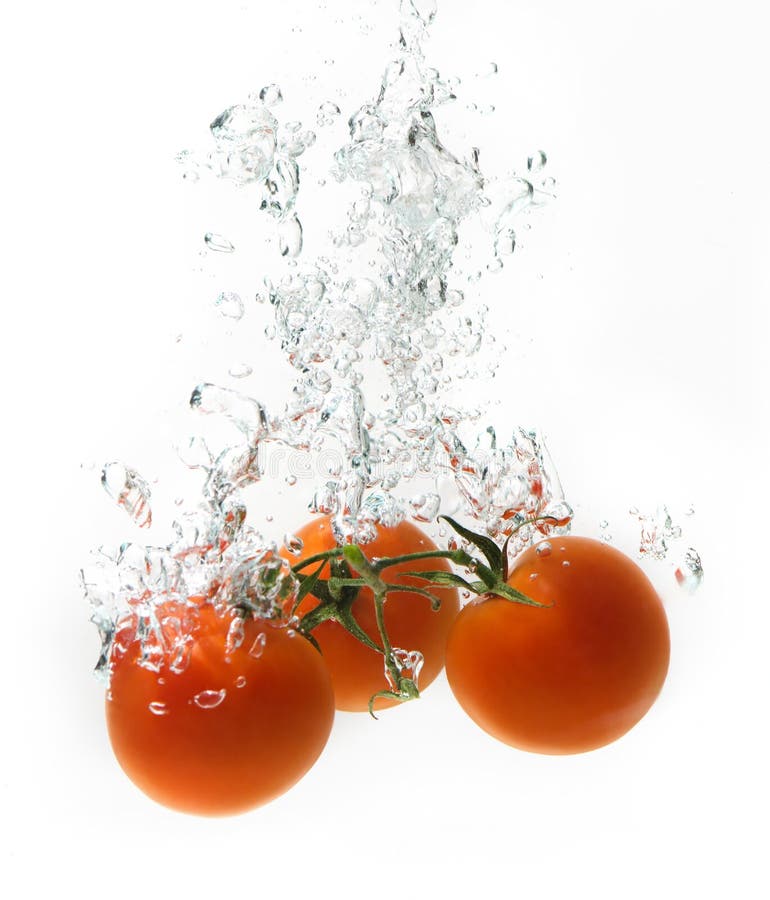 Red Tomatoes With Air Bubble On A Surface On Gray Background Stock ...