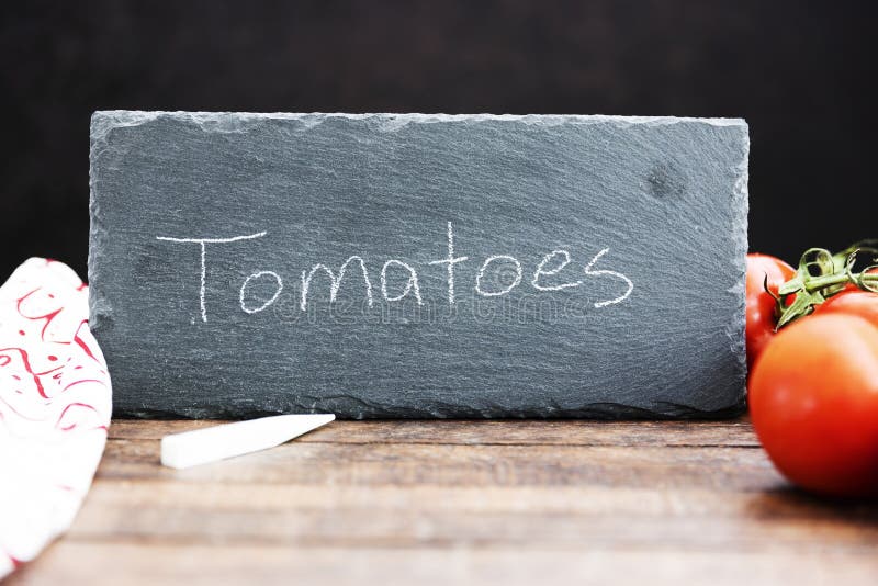 Tomatoes Written on Chalkboard Sign Stock Image - Image of tomato ...