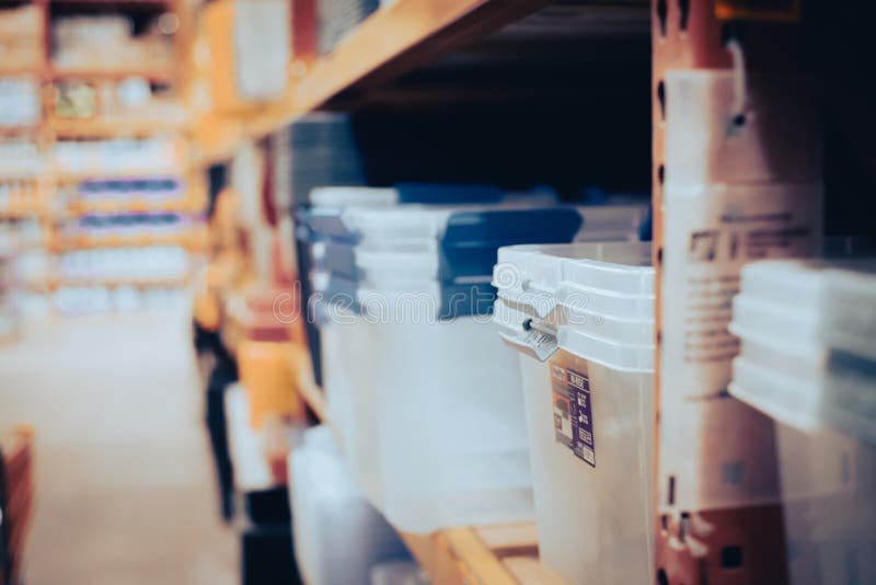 Toned Photo Hardware Store Aisle with Full Stack of Transparent Boxes ...