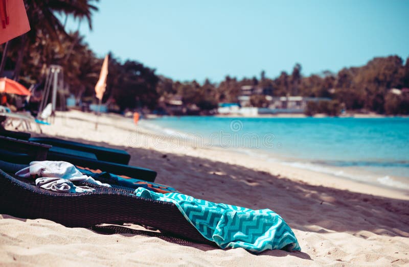 Toned View of the Tropical Beach with the Sunbed and Mess on it Stock ...