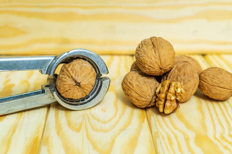 Tongs Chop Nuts on an Old Vintage Table before Cooking Stock Image ...