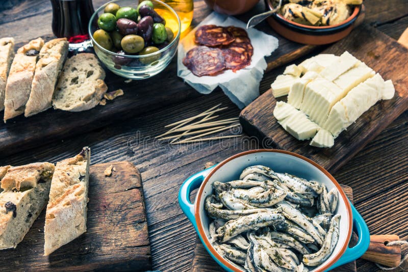 Sharing Authentic Spanish Tapas with Friends in Bar Stock Image - Image ...