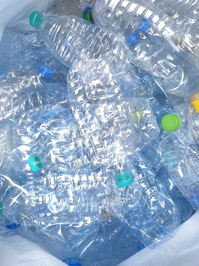 Tons of Clear Plastic Bottles Waiting To Be Recycled. Stock Image - Image of sunlight, glass ...