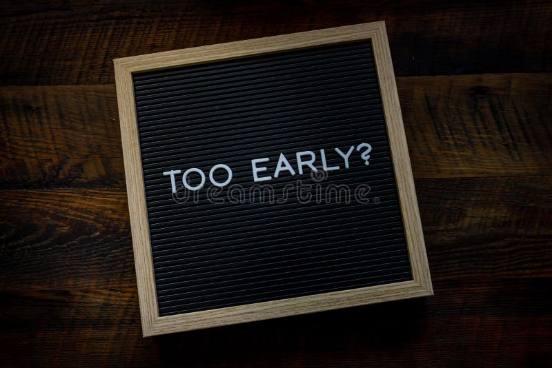 Too Early Message on Board stock photo. Image of current - 200720668