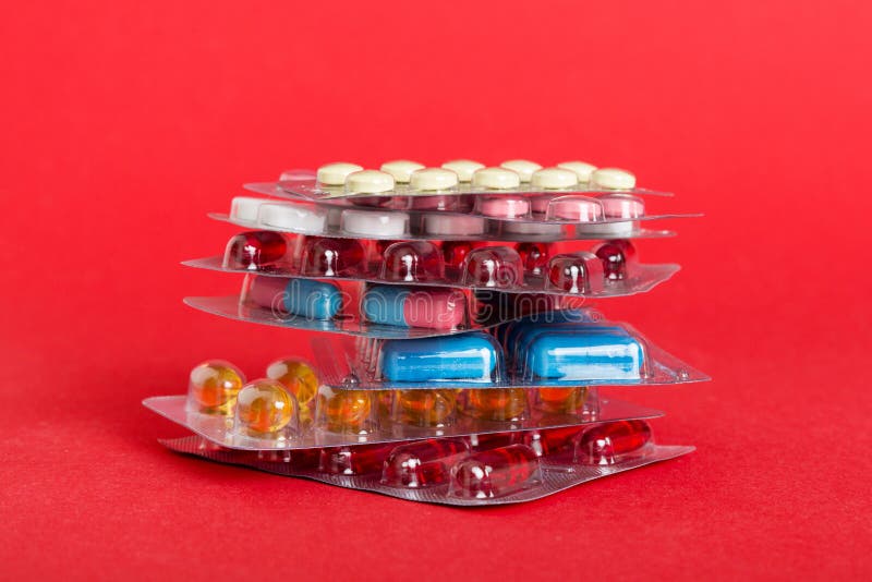 Too Many Different Pill Cartridges Stacked. Selective Focus. Packs of ... Too Many Different Pill Cartridges Stacked. Selective Focus. Packs of ...